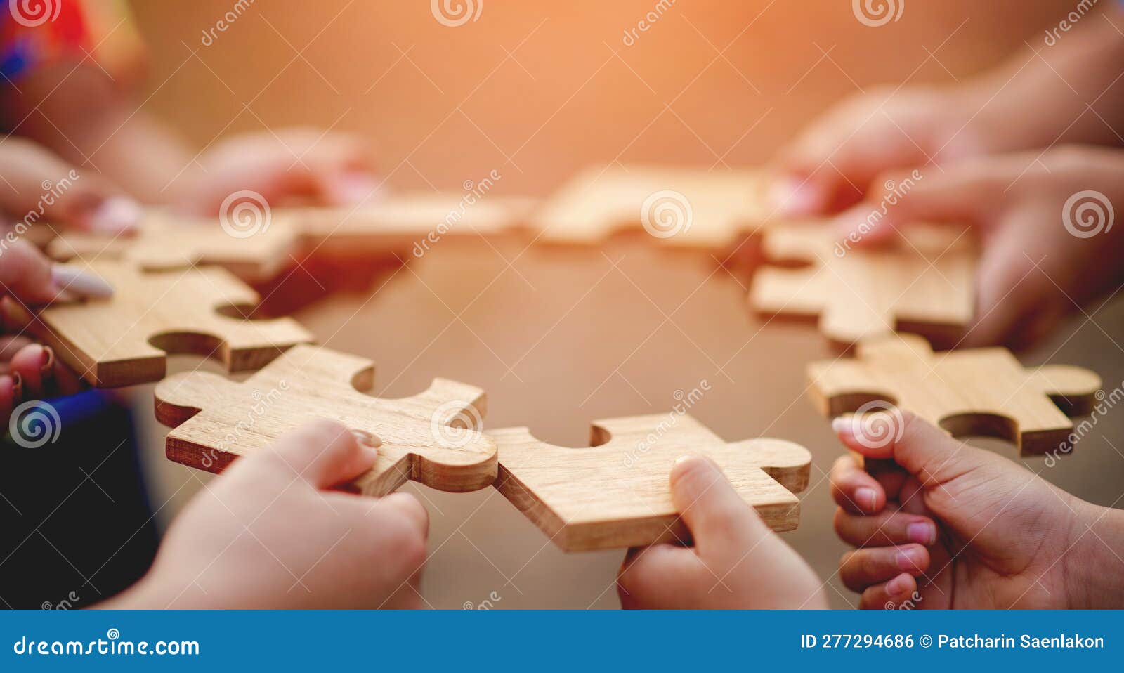 Jigsaw in Hand Puzzle Pieces Gather Together Teamwork the Concept of ...