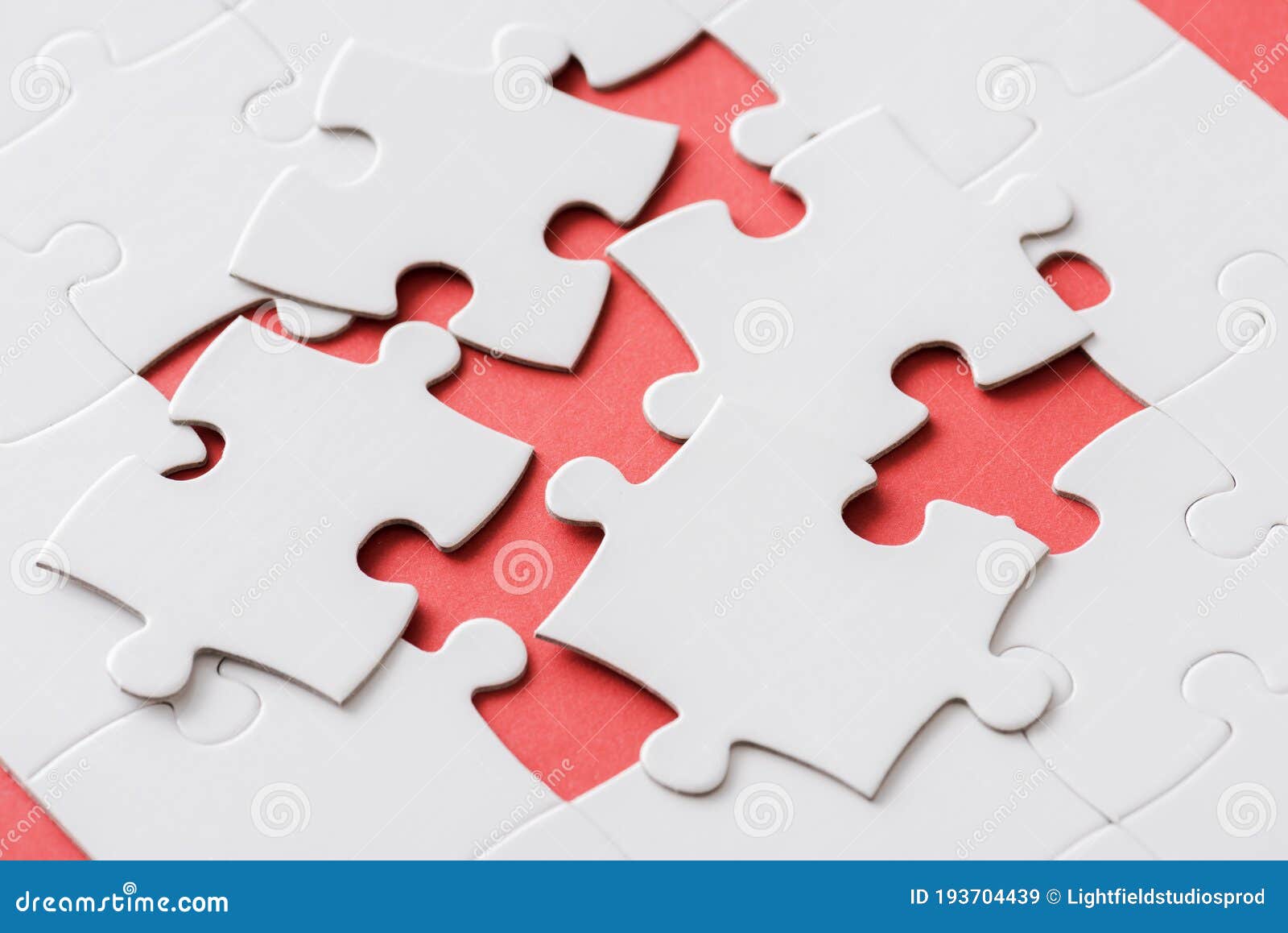 Jigsaw Near Connected White Puzzle Pieces on Red Stock Image - Image of ...