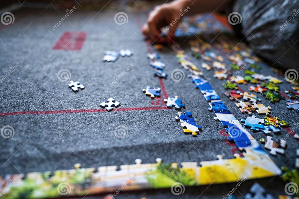 Jigsaw Piece of Puzzle Assembling. Final Stage of Project. Complex ...