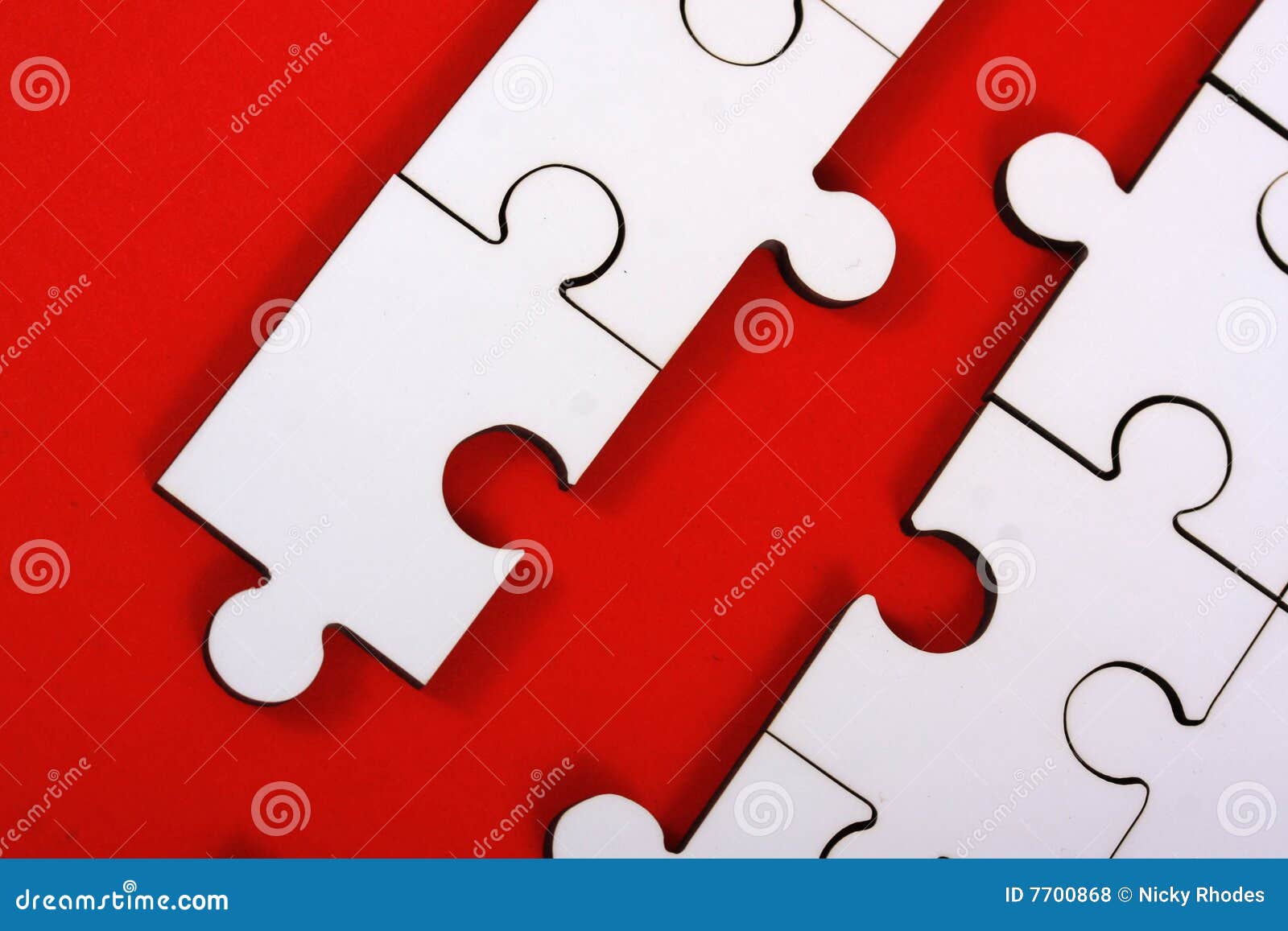 Jigsaw pieces on red stock photo. Image of jigsaw, separate - 7700868