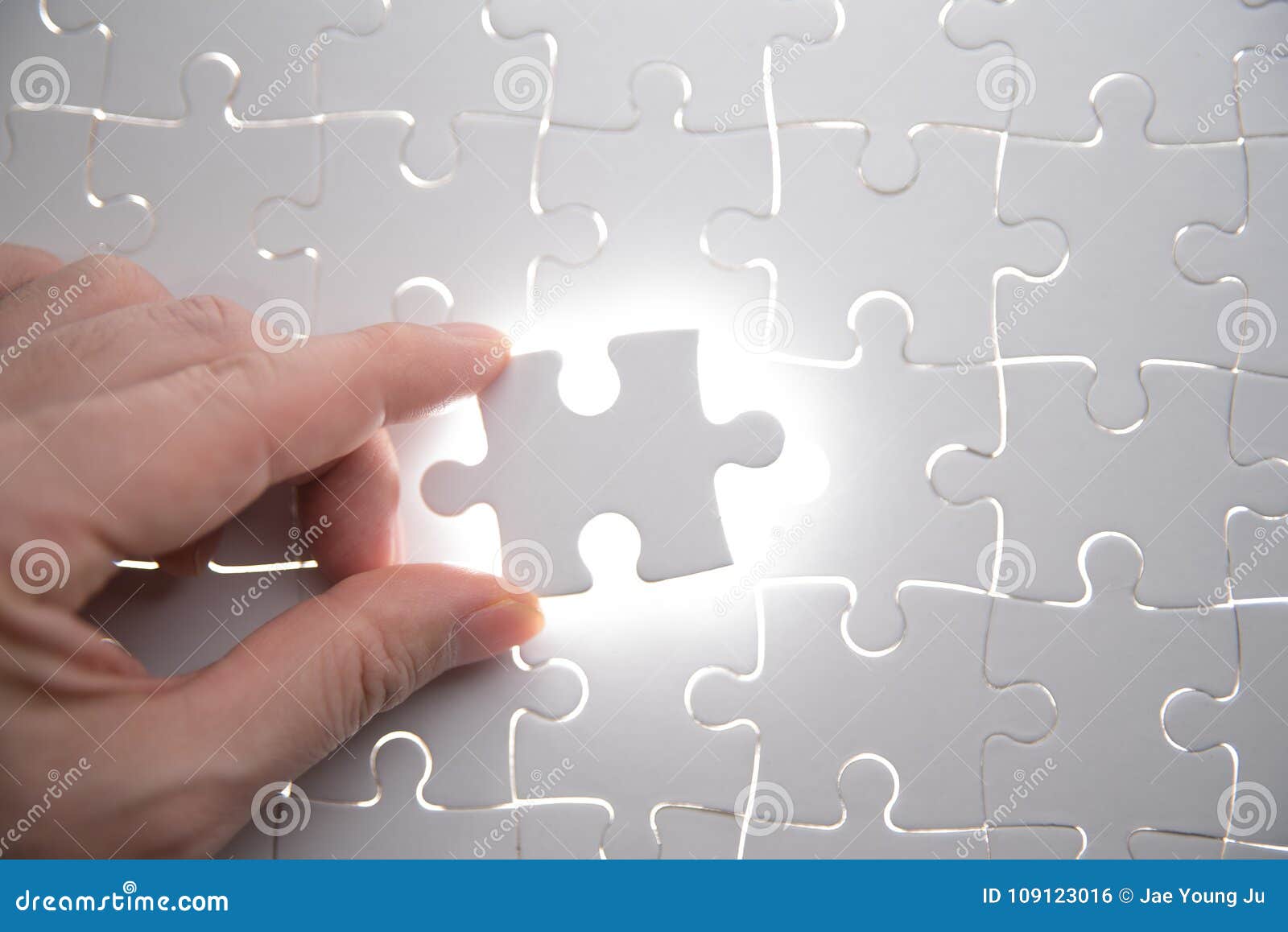 Jigsaw Puzzle Piece with Light Glow. Stock Photo - Image of business ...