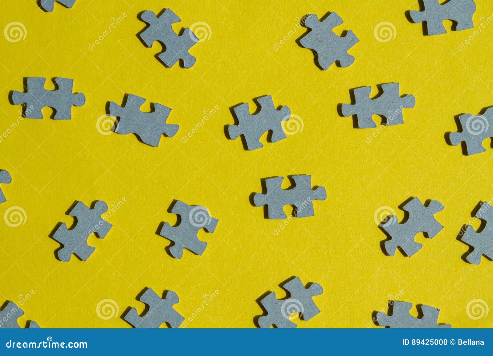 Jigsaw Puzzle Pieces on Yellow Background Stock Photo - Image of ...