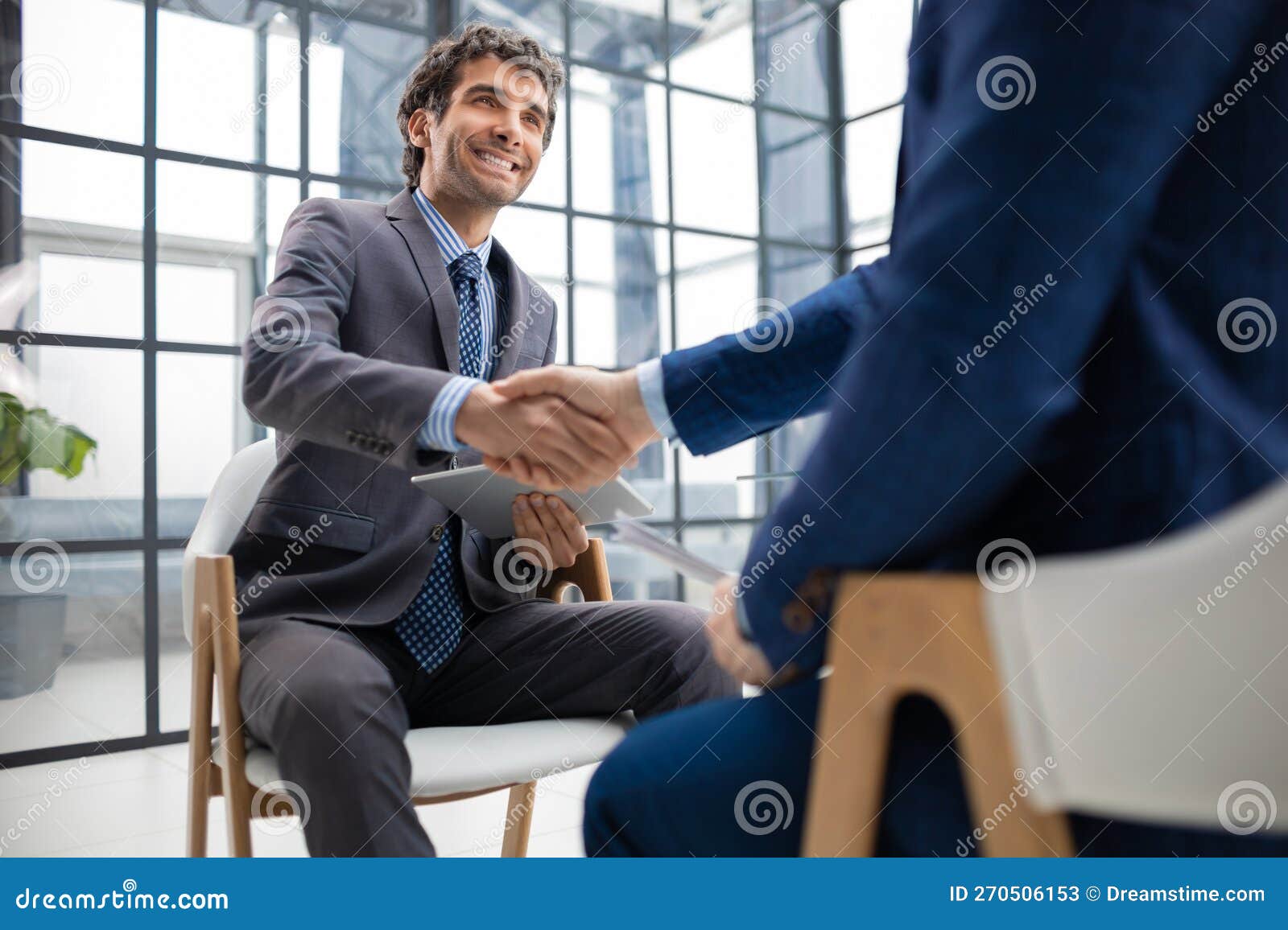 Job Applicant Having Interview. Handshake while Job Interviewing. Stock ...