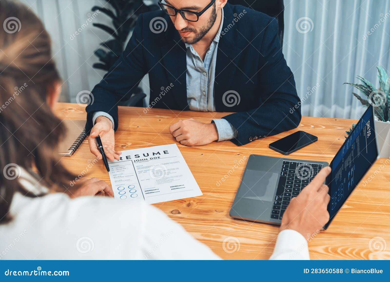 Job Candidate Engaging Conversation with Interviewer during Job ...