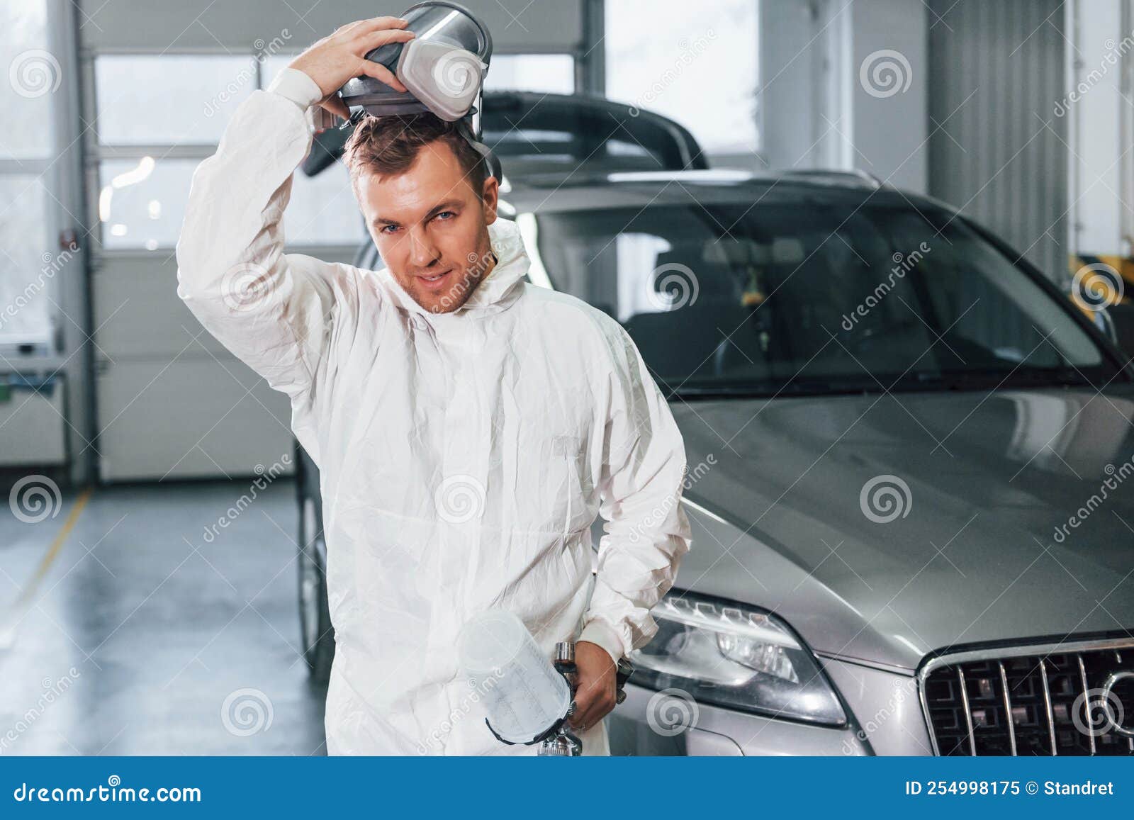 Job is Done. Man in Uniform is Working in the Auto Service Stock Image ...