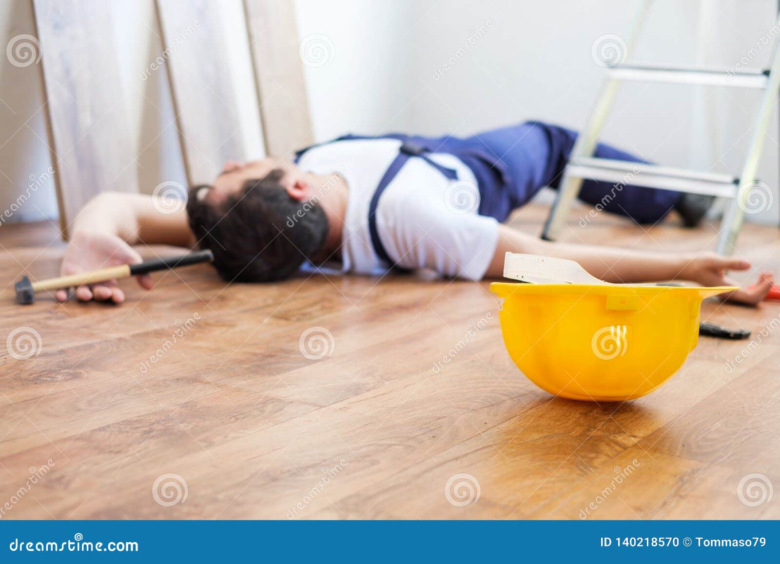 On the Job Injury of One Worker Just Fallen from a Ladder Stock Photo ...