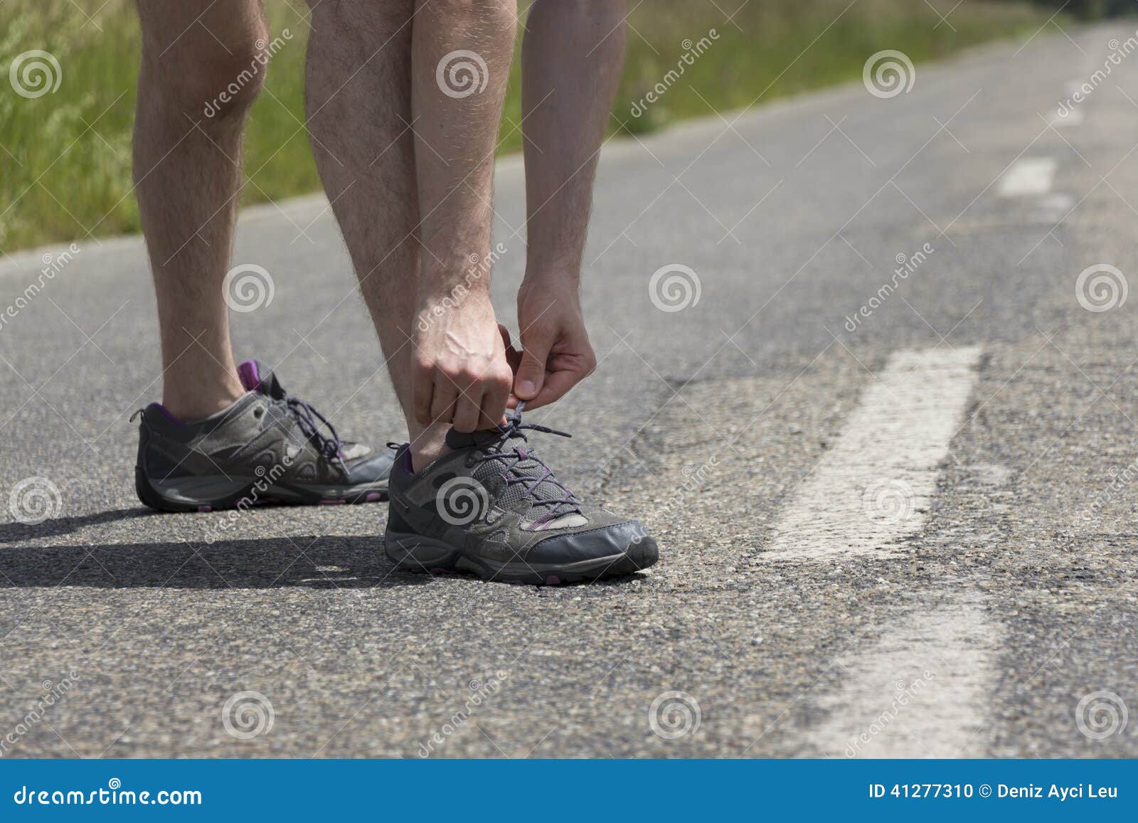 Jogger Man Binding the Shoe Strings Stock Photo - Image of feet ...