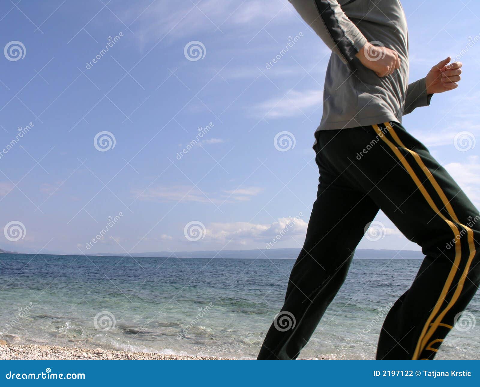 Jogging at the beach editorial photography. Image of running - 2197122