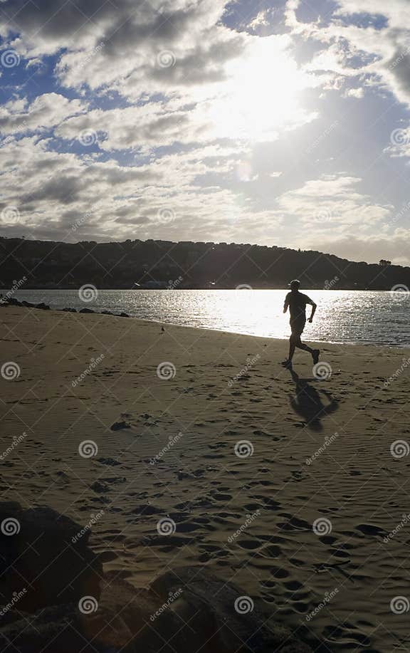 Jogging on the Beach stock photo. Image of jogger, fitness - 680204