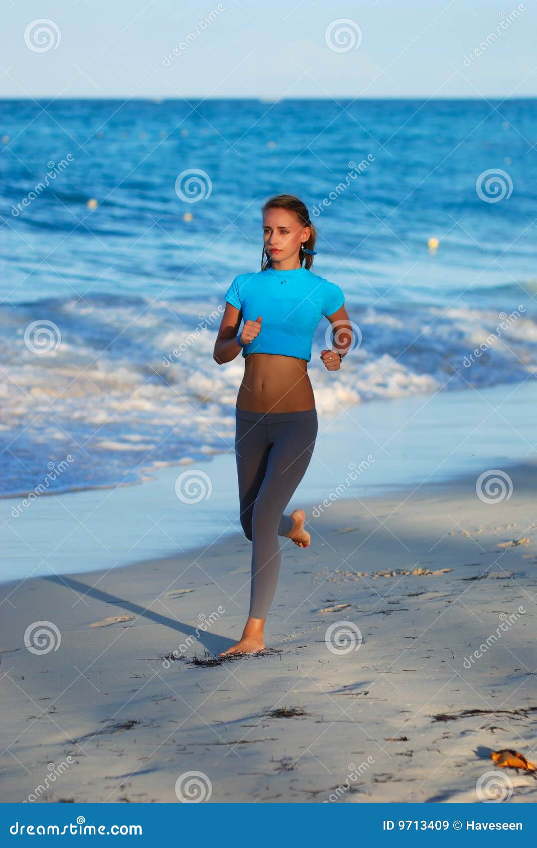 Jogging at beach stock image. Image of active, action - 9713409