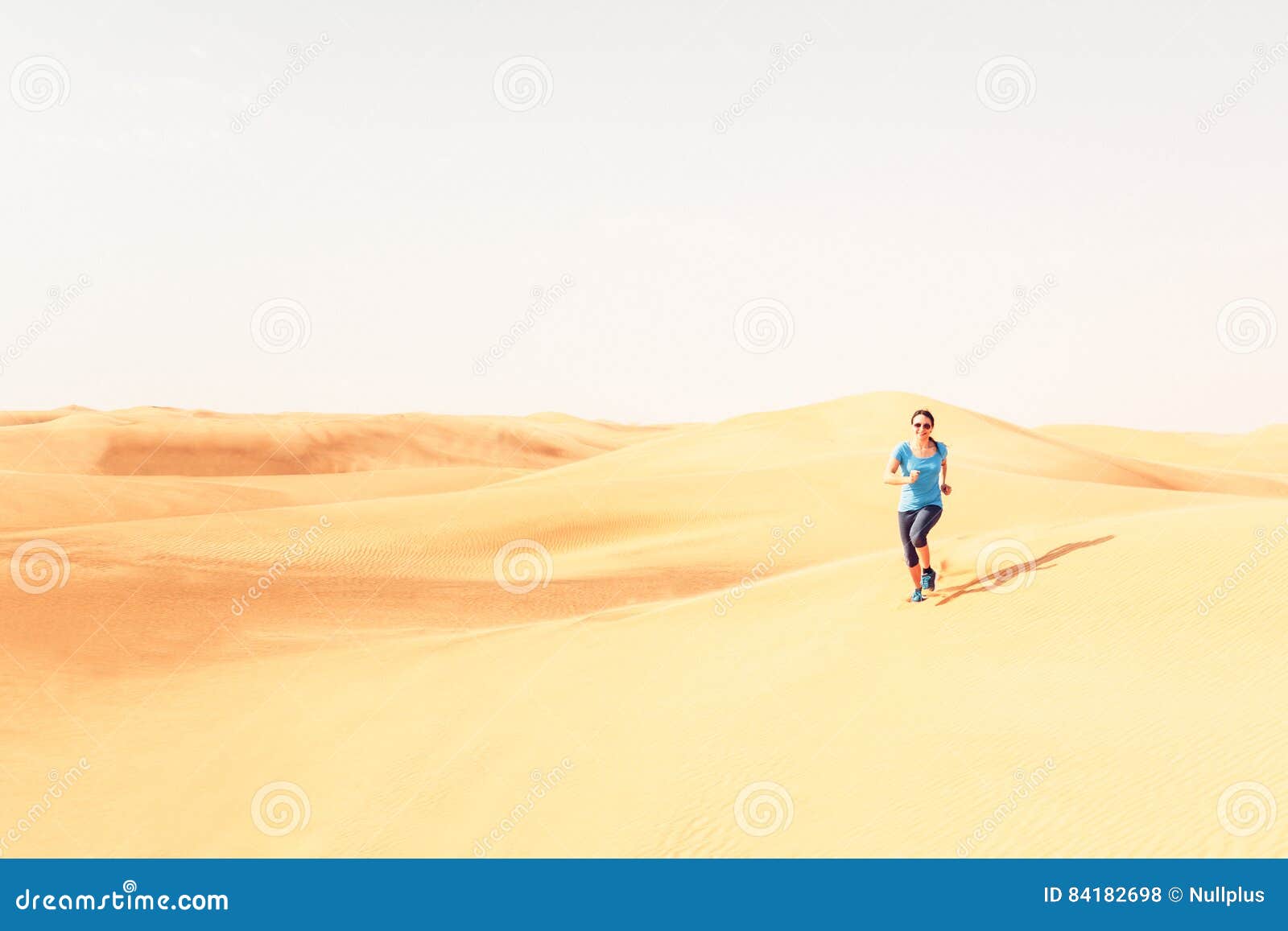 Jogging in the Desert stock photo. Image of sports, sweating - 84182698