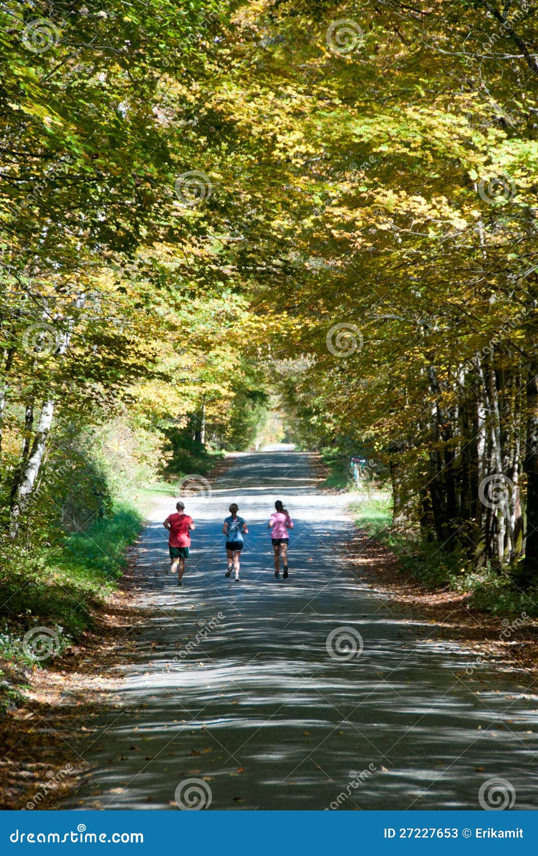 Jogging Down a Country Road in Fall Editorial Stock Photo - Image of ...