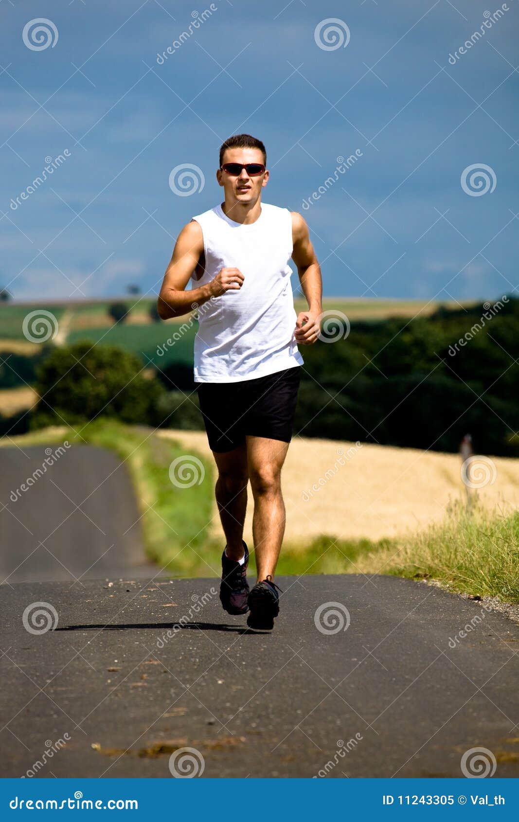 Jogging through the fields stock image. Image of healthy - 11243305