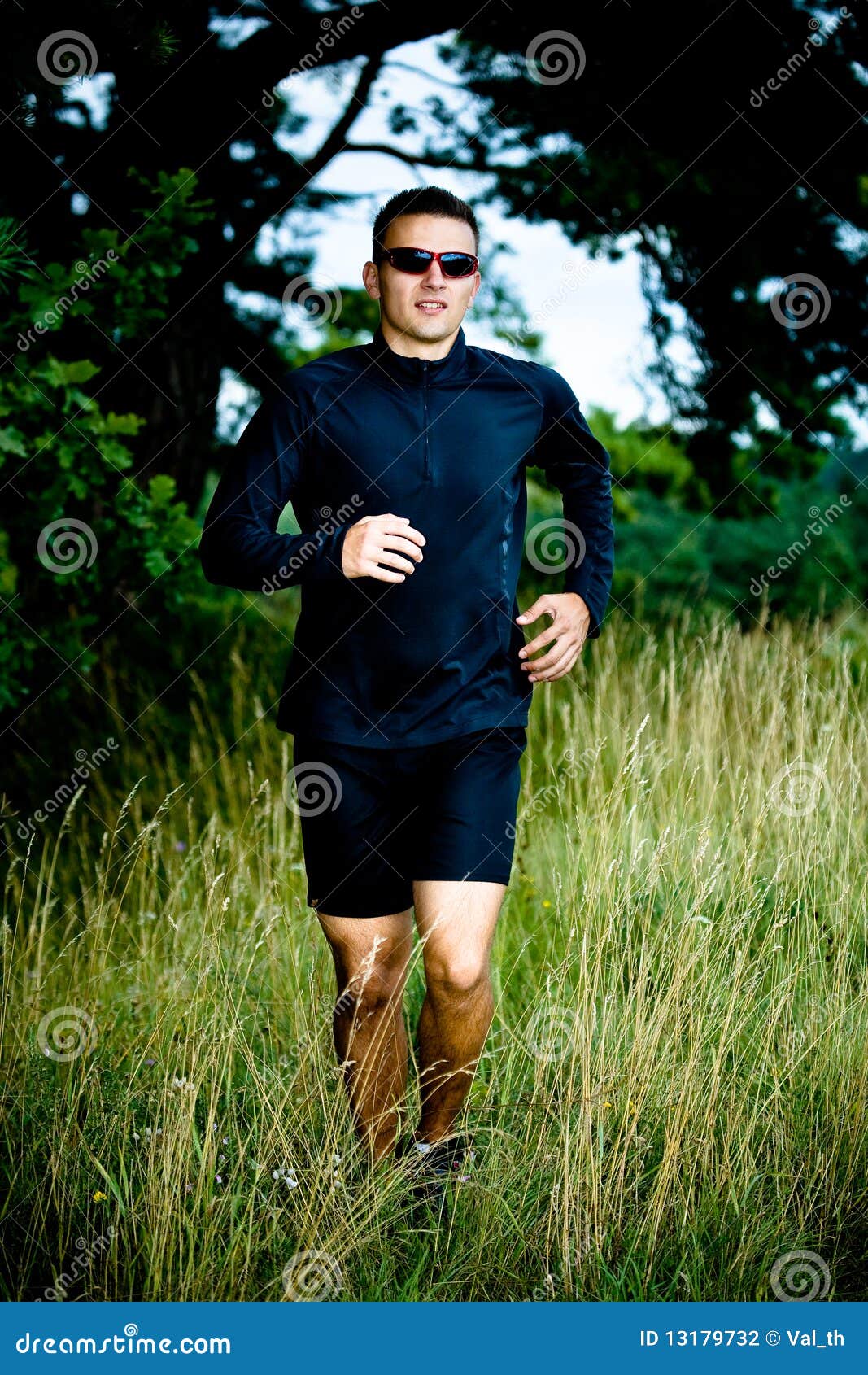 Jogging through the fields stock photo. Image of country - 13179732