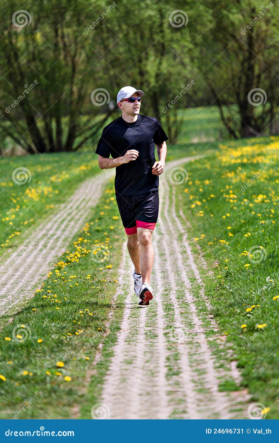 Jogging through the fields stock image. Image of competition - 24696731