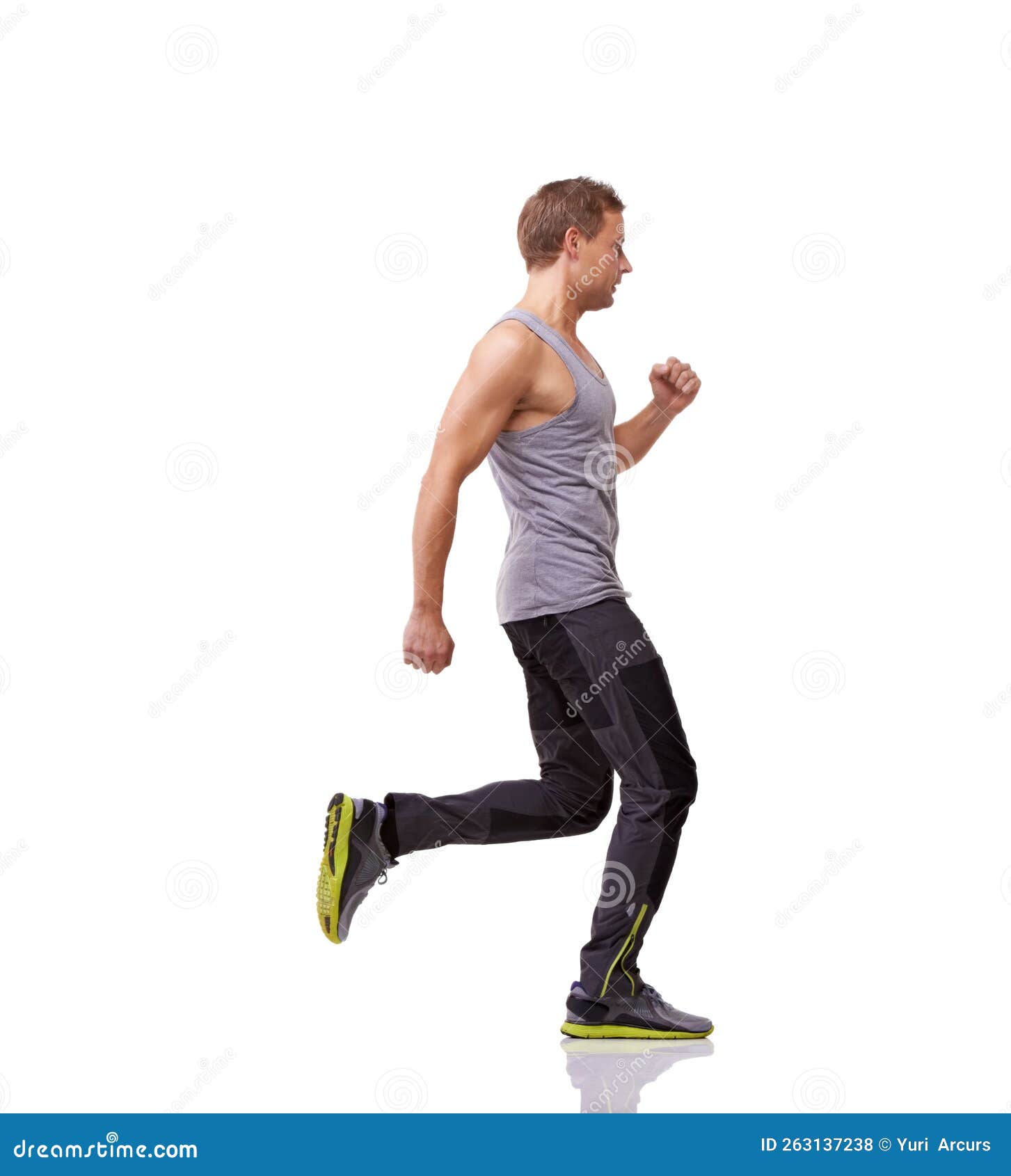 Jogging is His Workout. Sideways Studio Shot of a Man Jogging Across ...