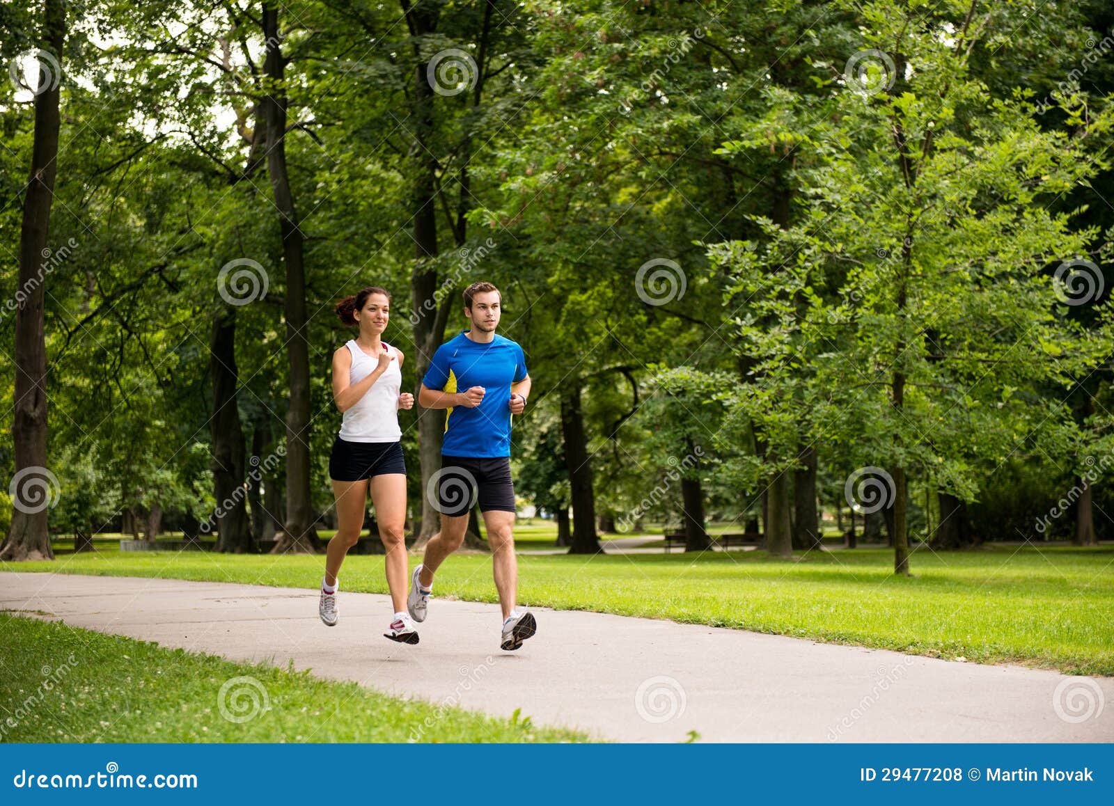 Jogging Together - Young Couple Running Stock Photo - Image of jogging ...
