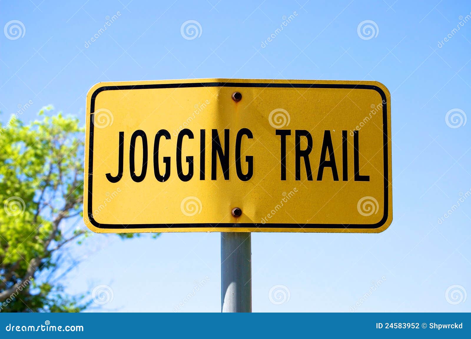 Jogging Trail Sign stock photo. Image of yellow, symbol - 24583952