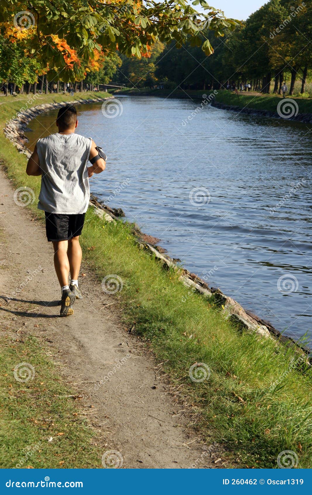 Jogging by the water stock photo. Image of male, lone, running - 260462
