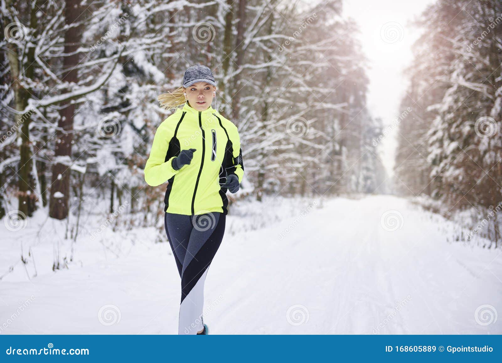 Jogging Woman in Winter Time Stock Image - Image of listen, sports ...