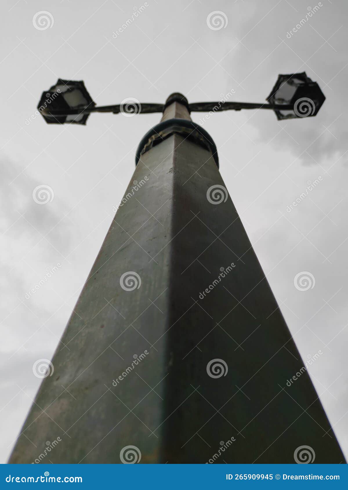 Vertical Low Angle Shot Of Three Poles With American Flags Royalty-Free ...