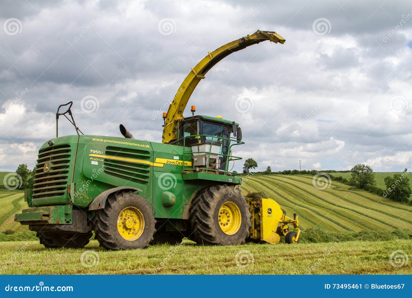 John Deere Forage Harvester with Rows of Grass Editorial Photo - Image ...