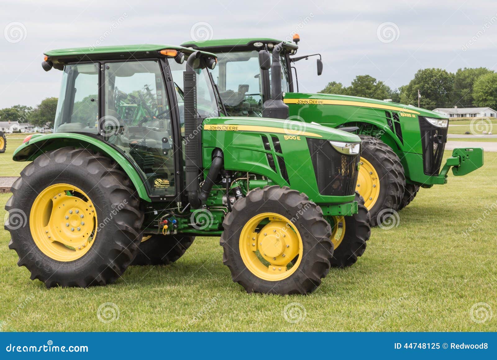 John Deere Models 5100E and 8335R Tractors Editorial Image - Image of ...