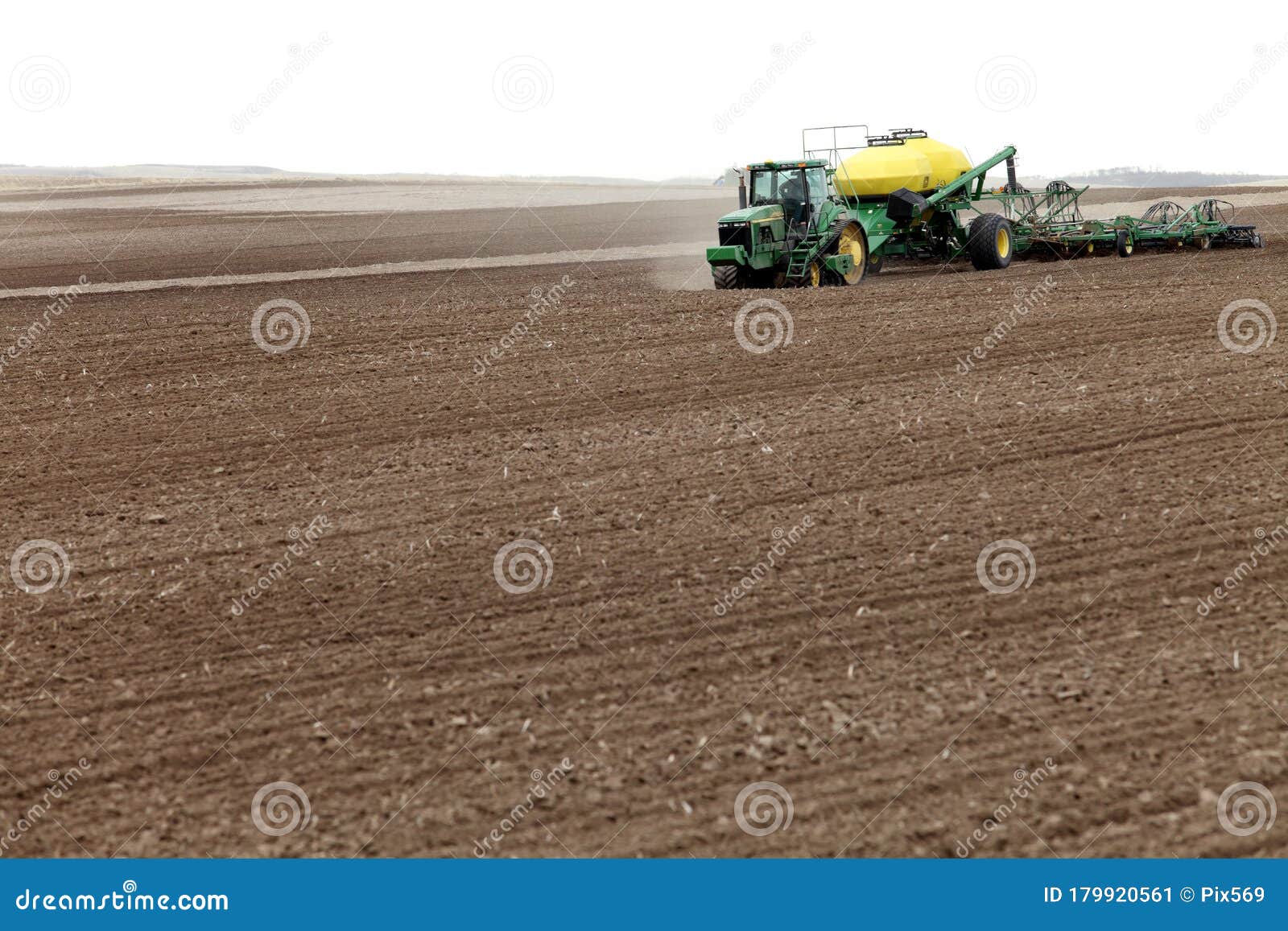 A John Deere Tractor Pulling a Planting Implement Editorial Photo ...