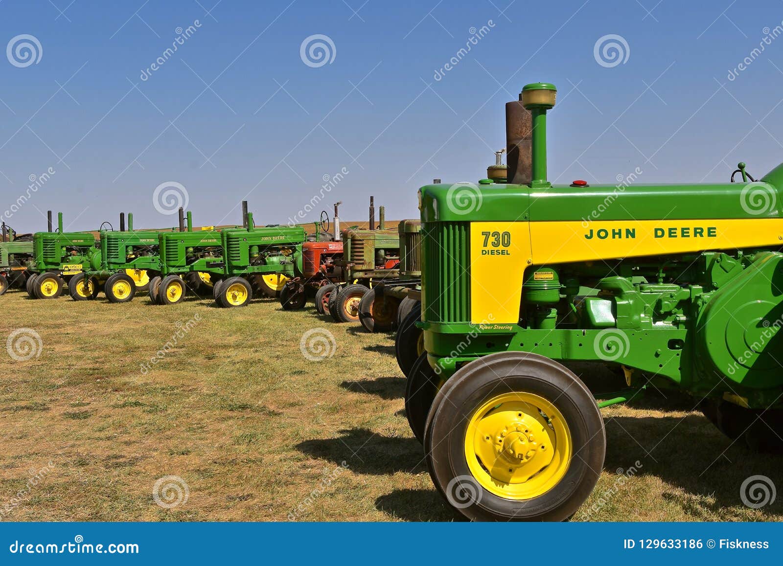 Old Two Cylinder John Deere Tractors Editorial Photo | CartoonDealer ... Old Two Cylinder John Deere Tractors Editorial Photo | CartoonDealer ...