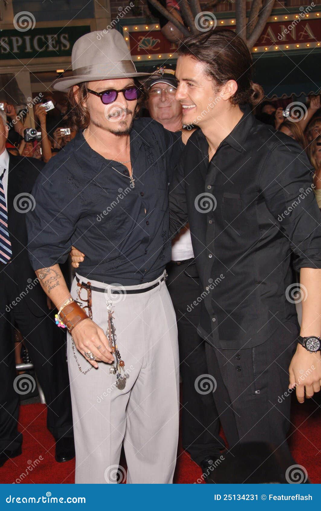Johnny Depp,Orlando Bloom editorial photo. Image of anaheim - 25134231