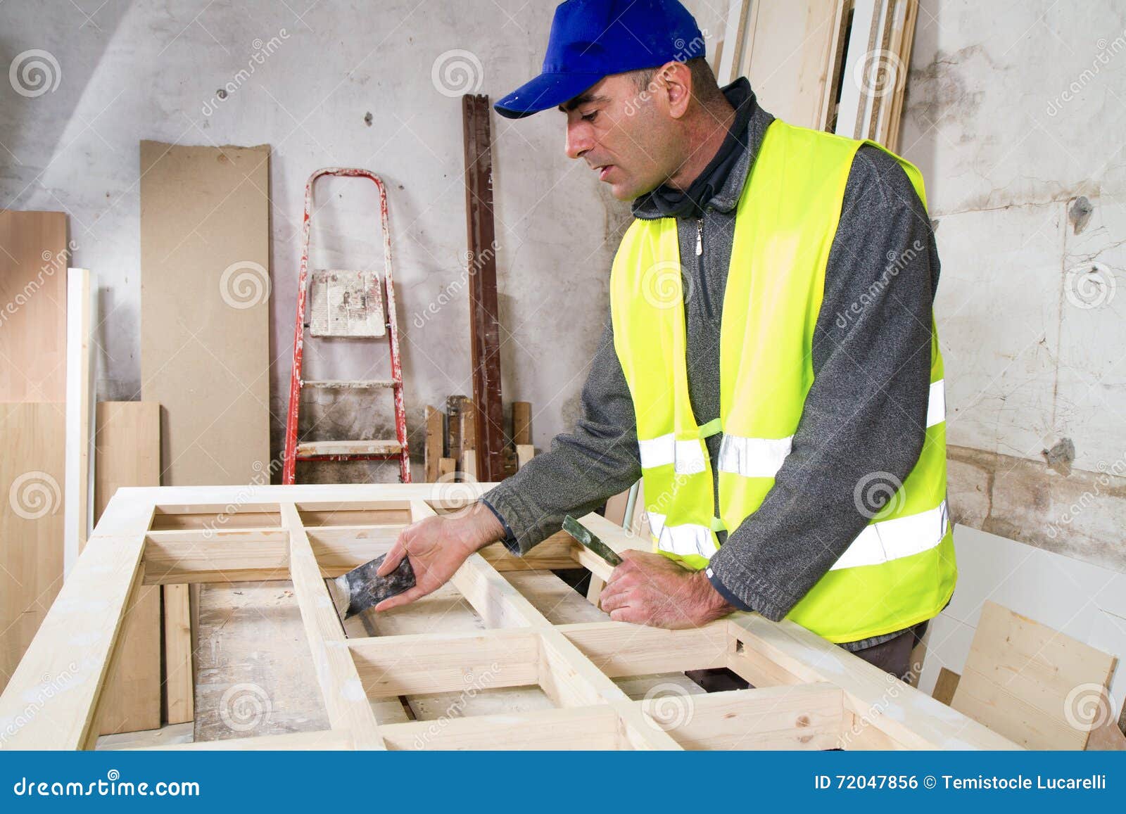 Joiner in his workshop stock photo. Image of woodworking - 72047856