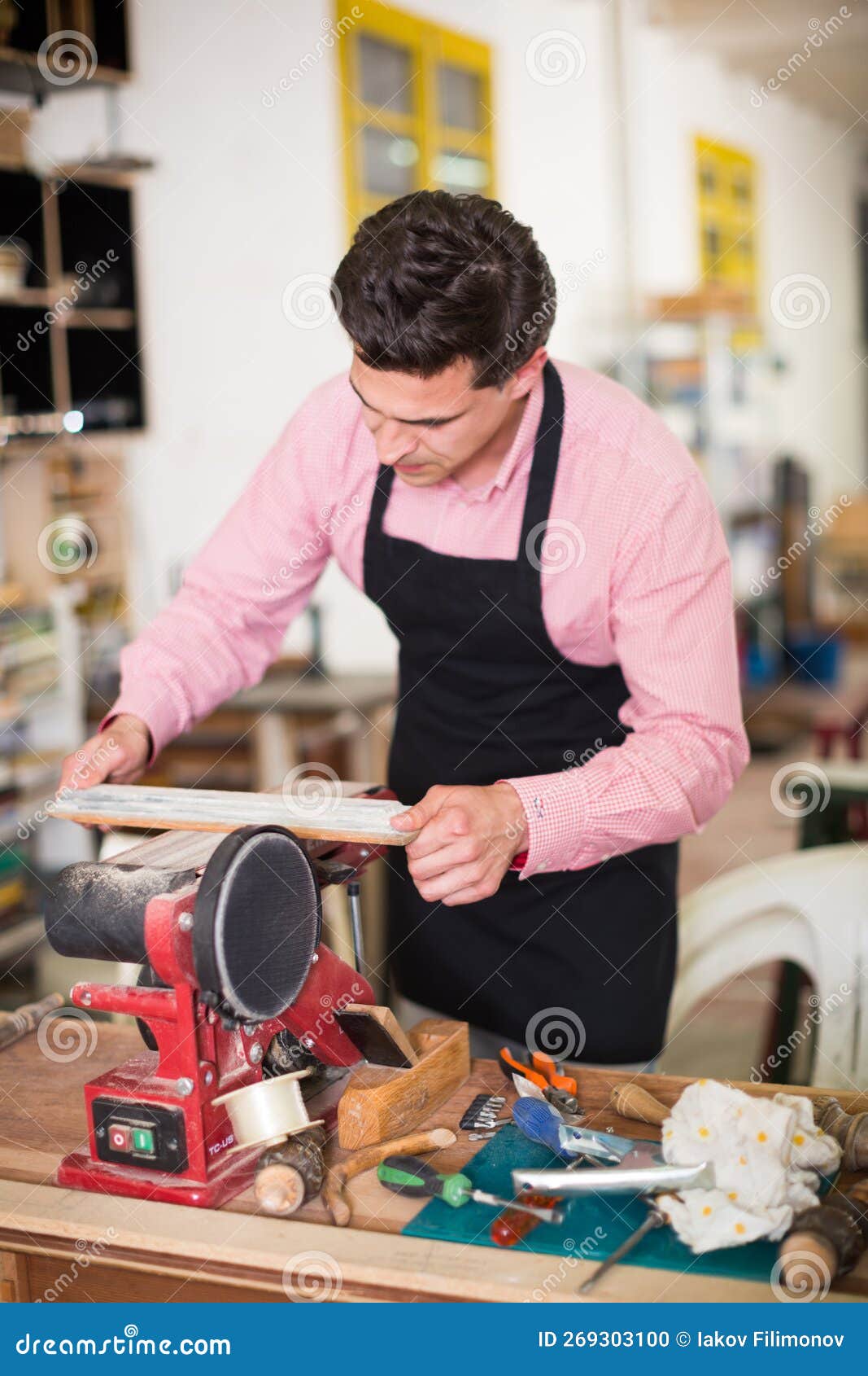 Joiner working on machine stock photo. Image of machine - 269303100