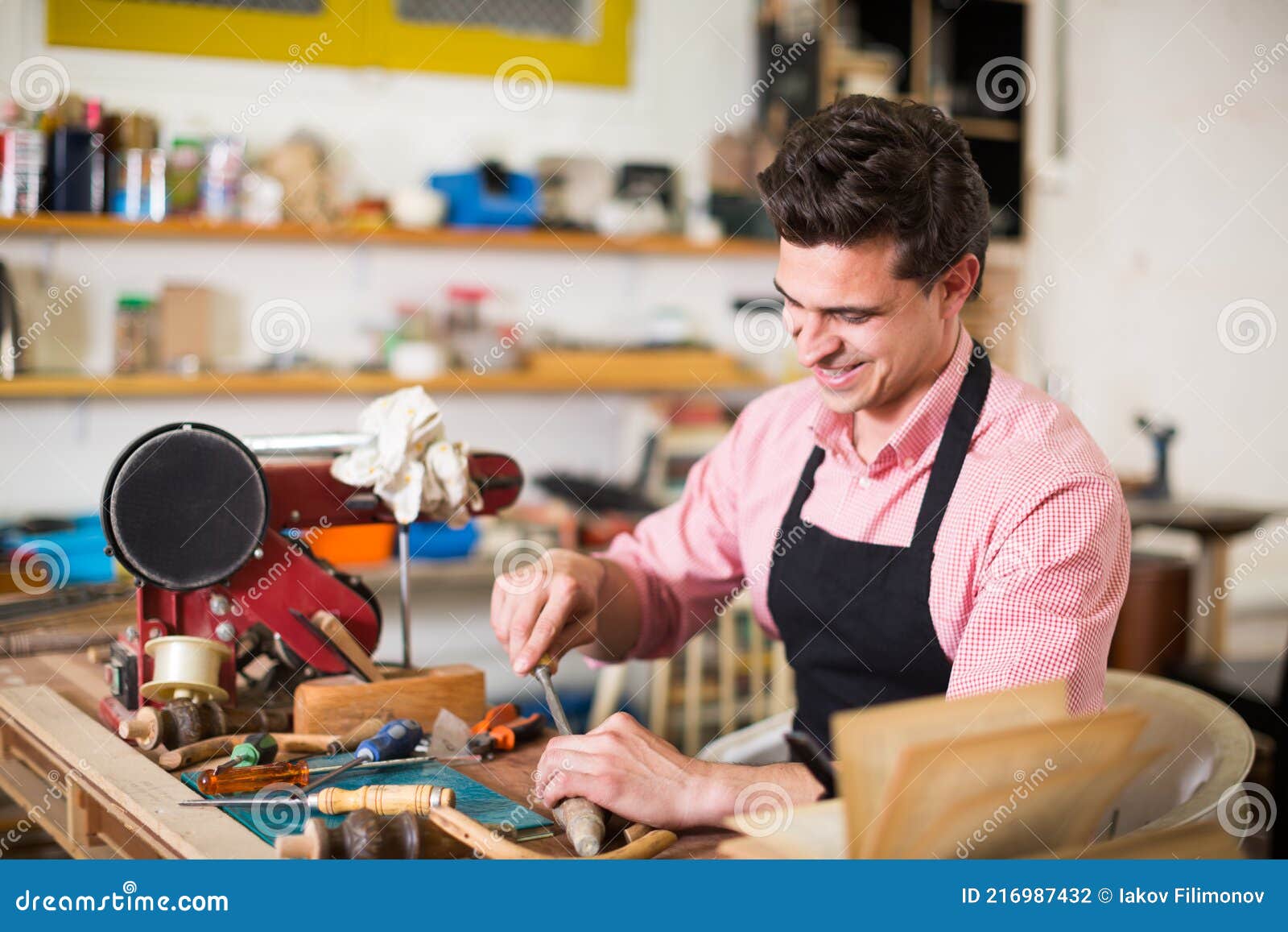 Joiner working in workshop stock photo. Image of activity - 216987432