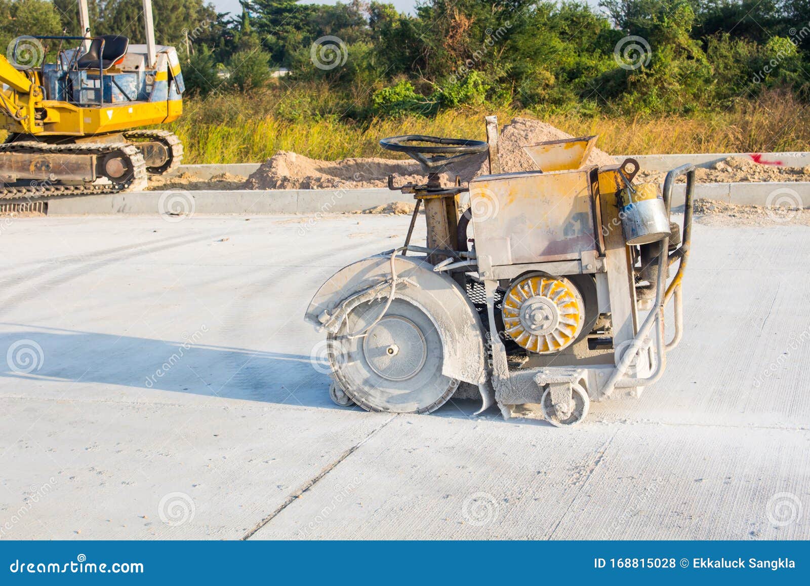 The Joint Cutter Machine on a Brushed Concrete Surface. Construction ...