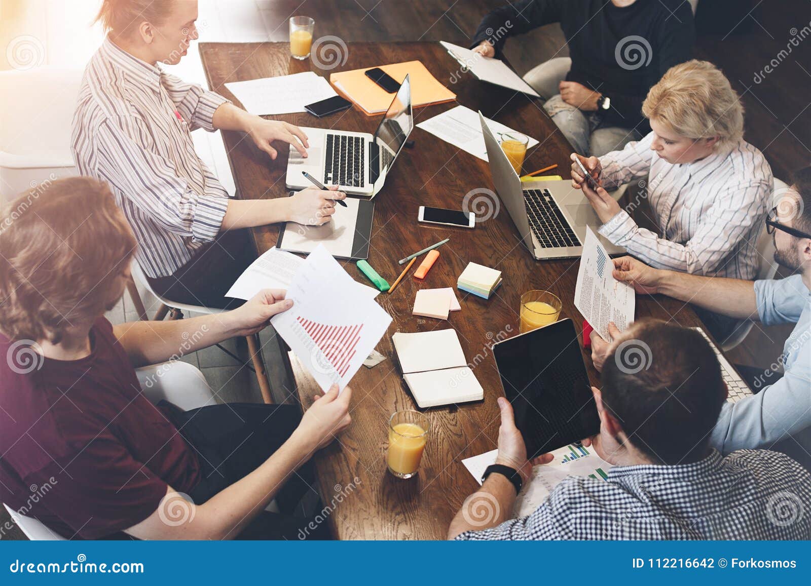Joint Work of Young Colleagues at a Large Table with Different E Stock ...