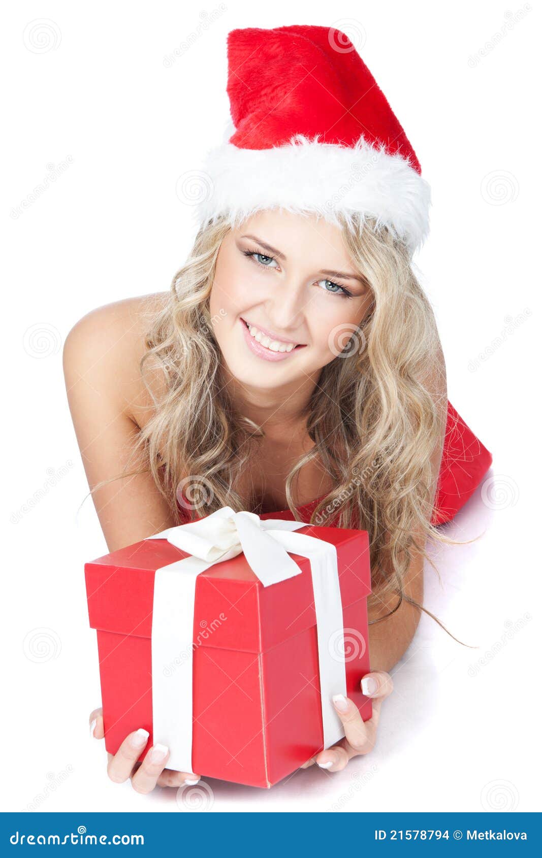 Jolie Fille Dans Le Chapeau Daide De Santa Avec Le Cadeau Rouge Photo