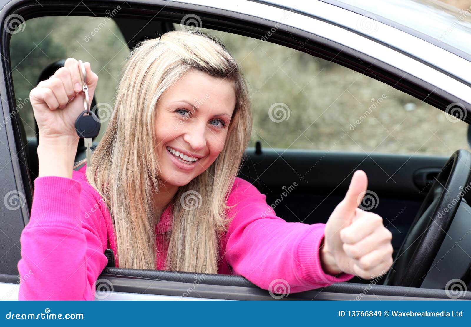 Jolly Female Driver Showing a Key Stock Image - Image of girl, learning ...