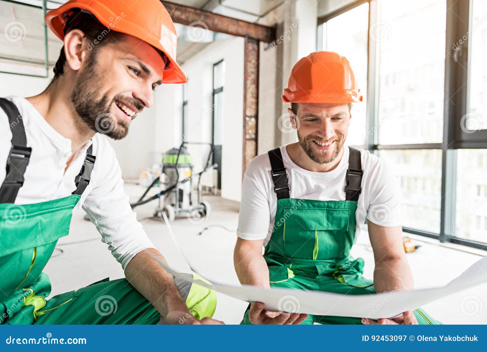 Jolly Smiling Builders Keeping Plan Stock Image - Image of caucasian ...