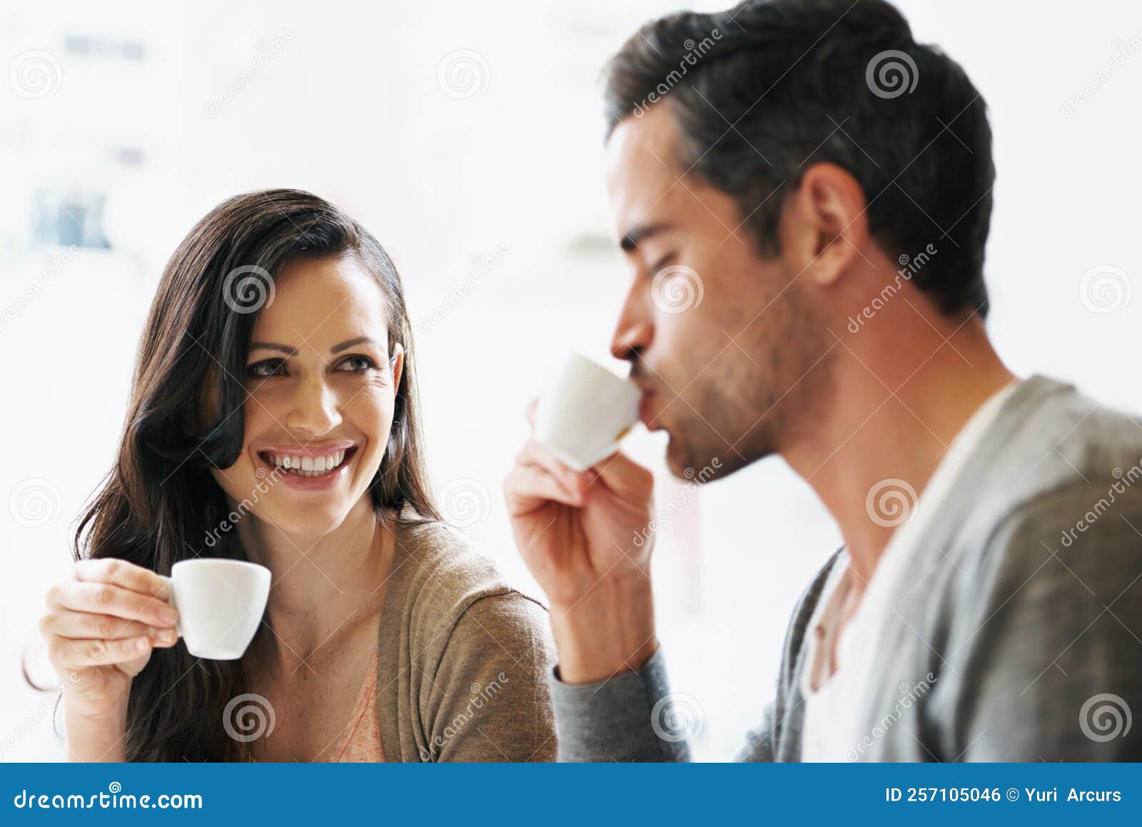 Jonesing for Some Java. a Young Couple Grabbing a Cup of Coffee ...