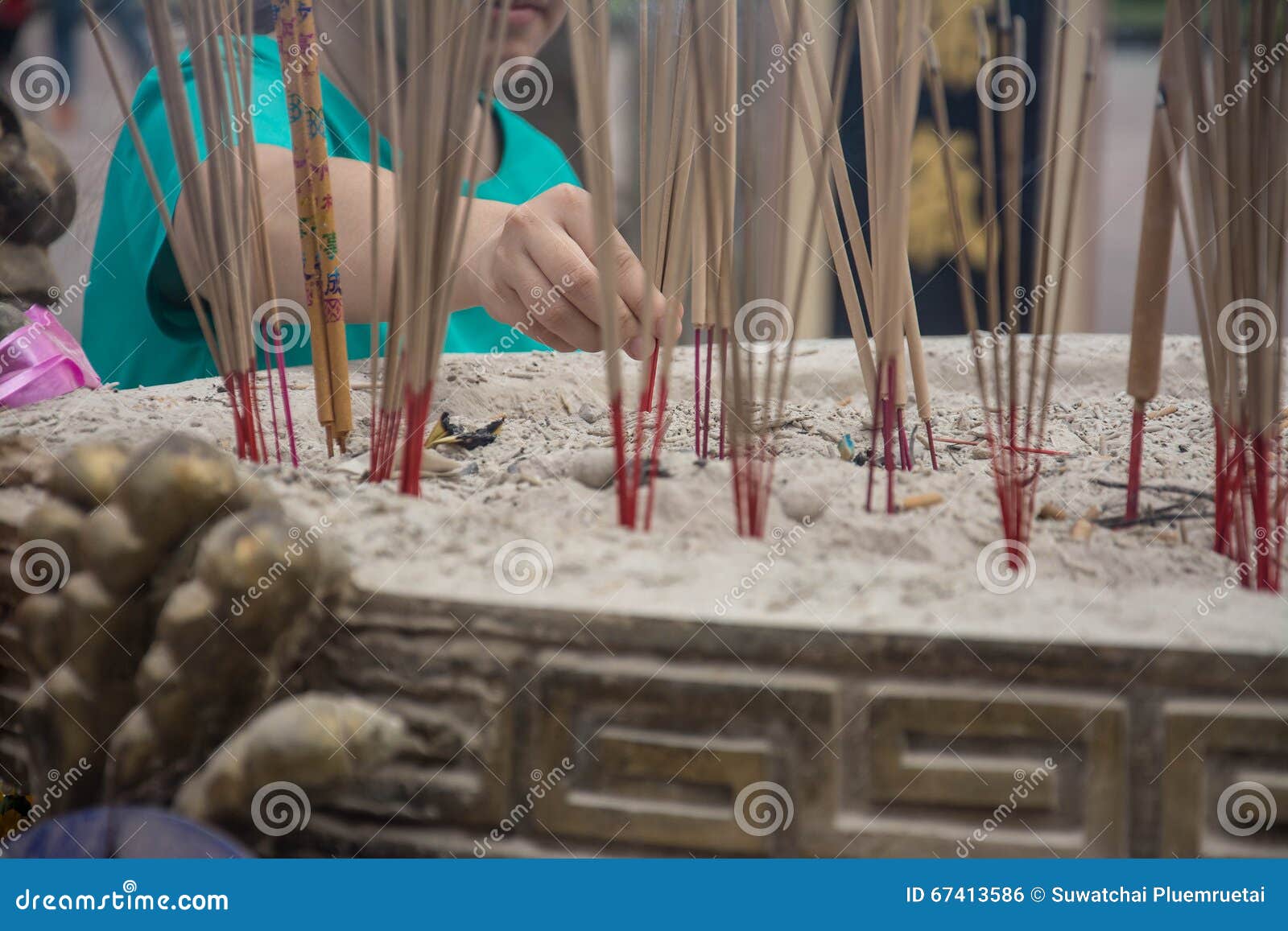 Joss sticks in to pot stock photo. Image of container - 67413586