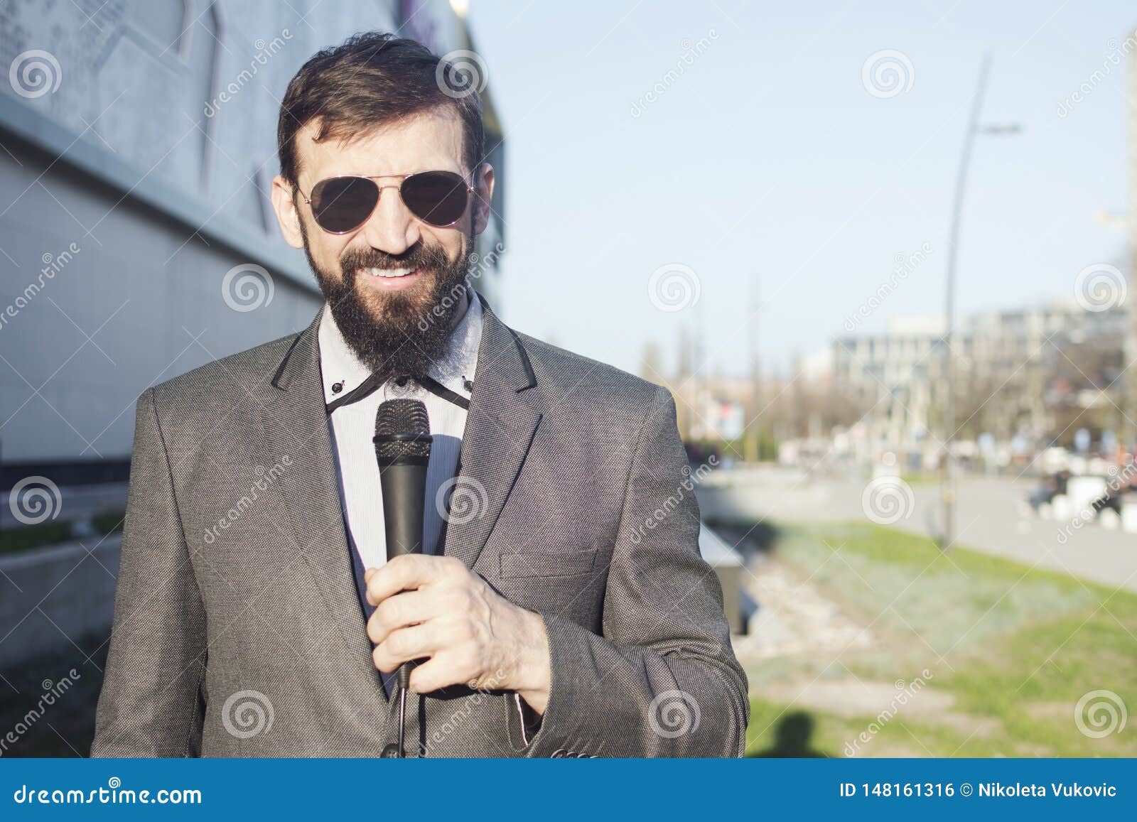 Journalist in live program stock photo. Image of smiling - 148161316