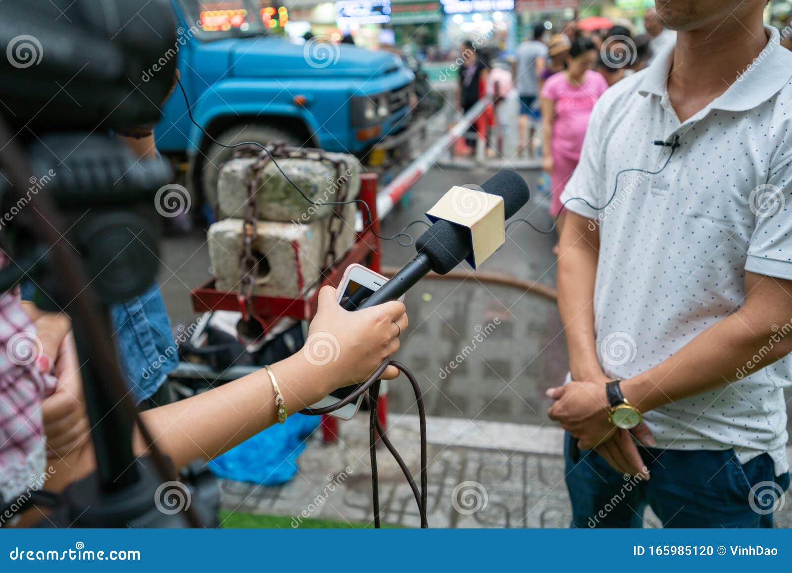 Journalist with Microphone Interviewing on Street Closeup Stock Photo ...