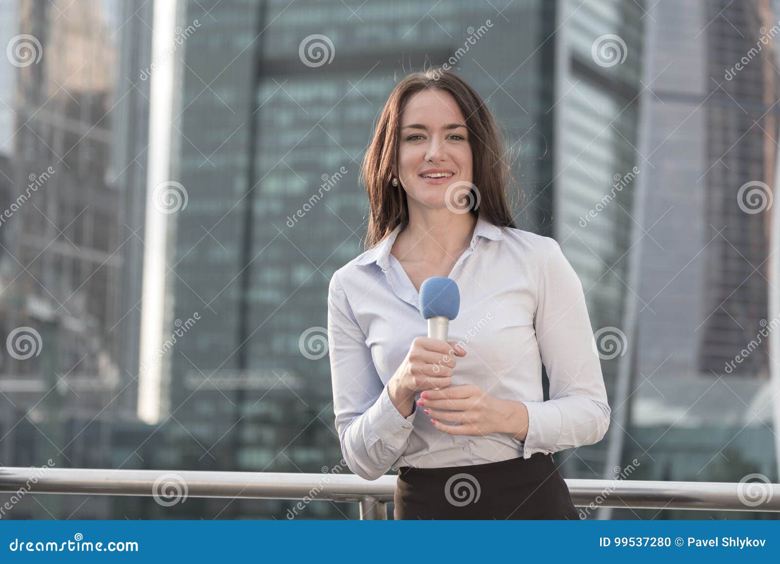 Journalist Is Reporting On A Business Center Background Stock Photo ...
