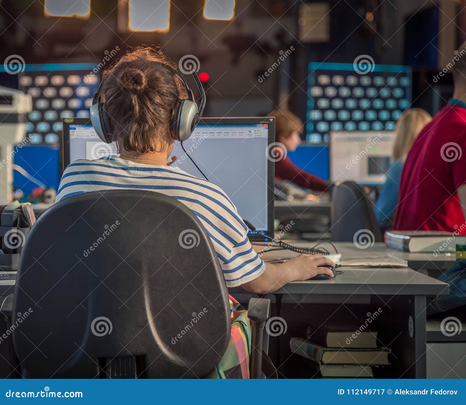 A Journalist Working on a Computer in Newsroom Editorial Photography ...