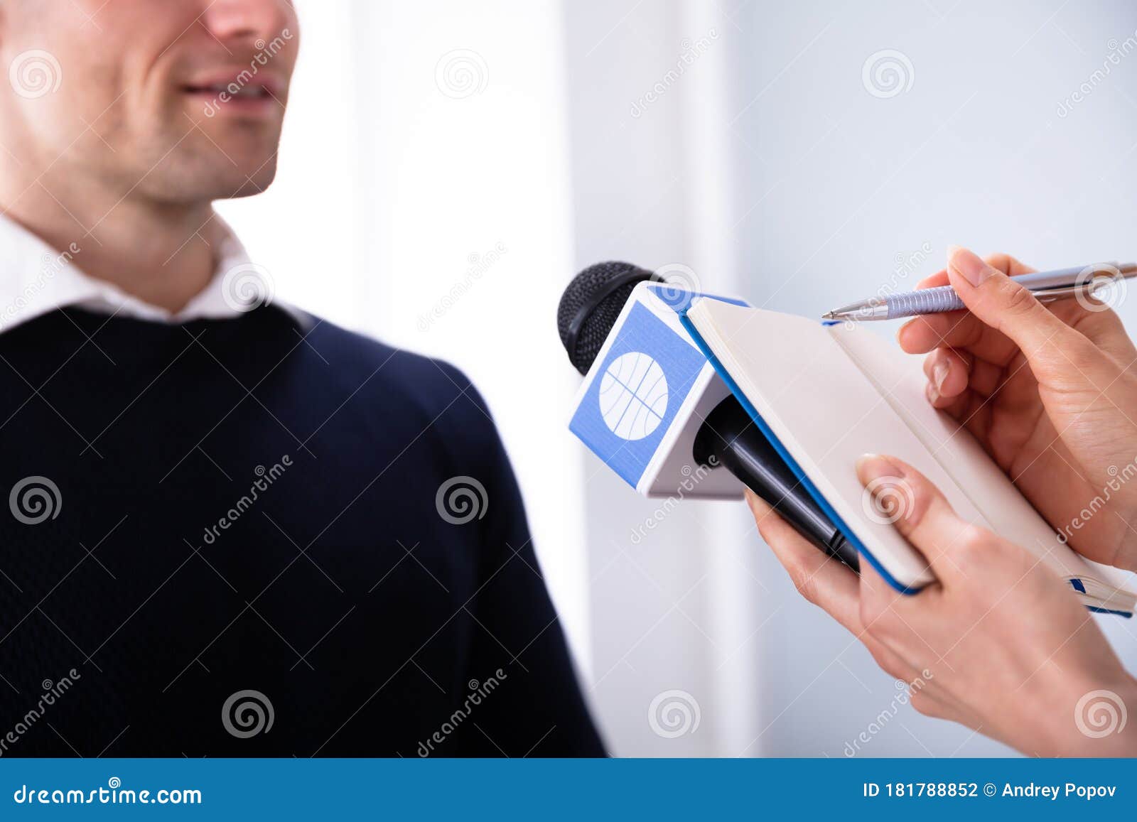 Journalist Writing on Diary while Taking an Interview Stock Photo ...