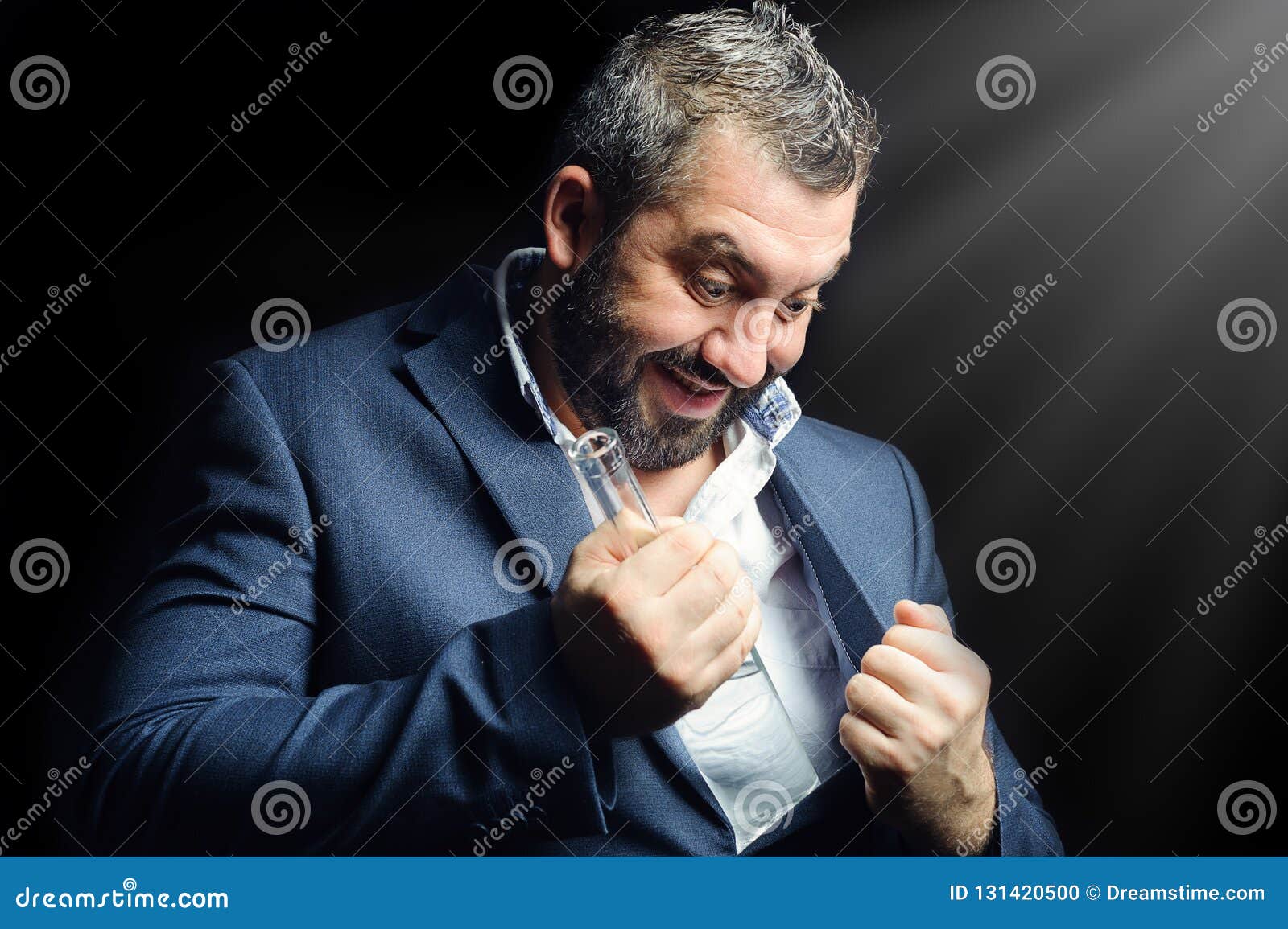 The Joy on the Face of an Alcoholic with a Bottle of Vodka Stock Photo ...