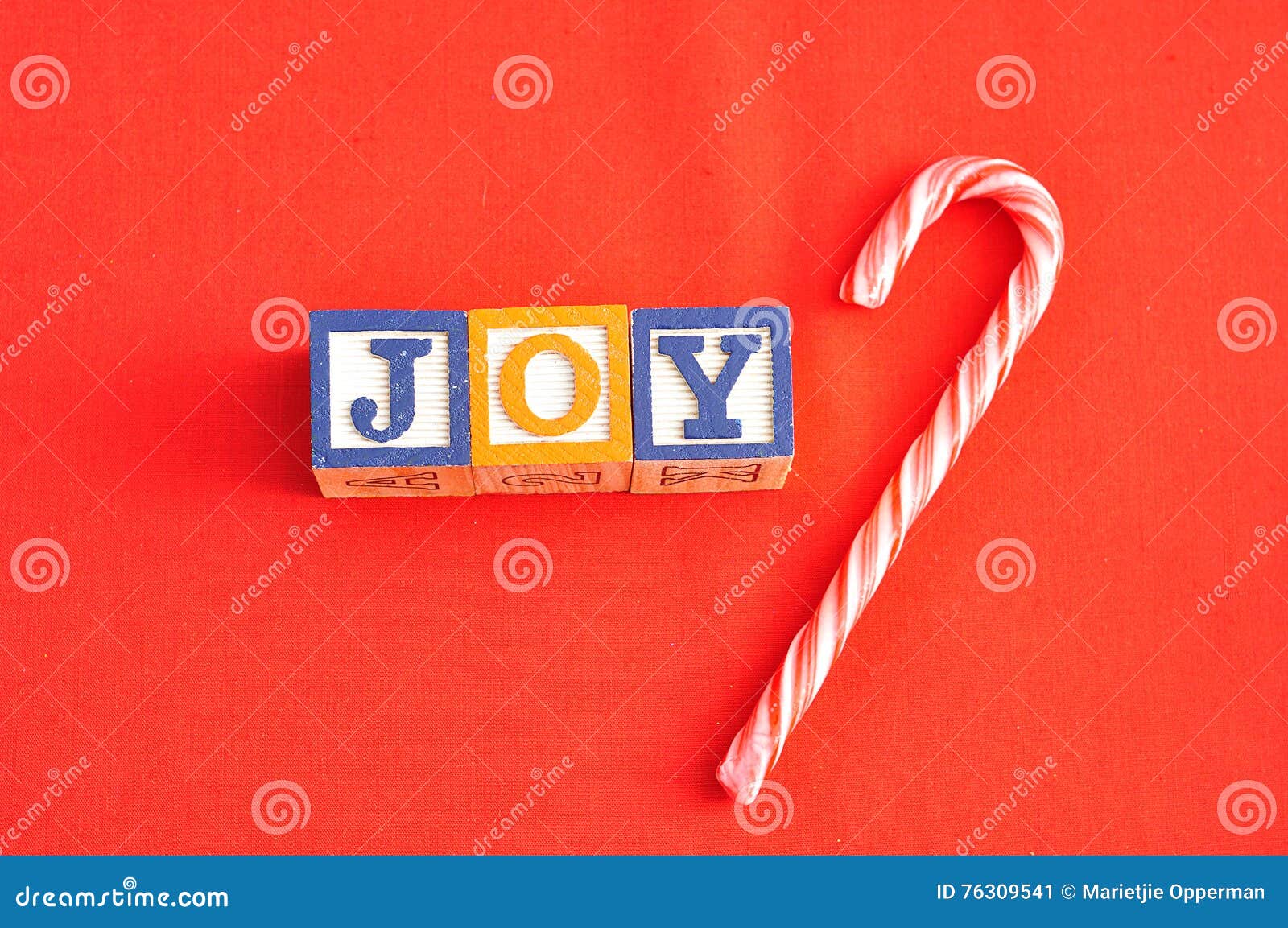 Joy Spelled with Alphabet Blocks on a Red Background Stock Image ...