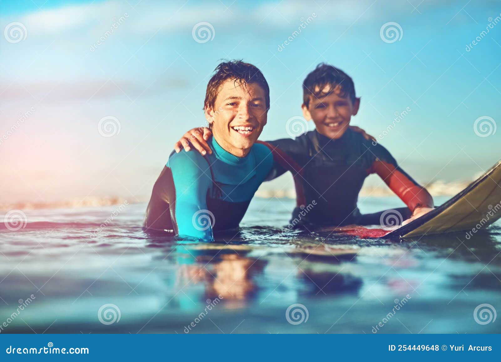 The Joy of Surfing , Share the Stoke. Two Young Boys Out Surfing. Stock ...