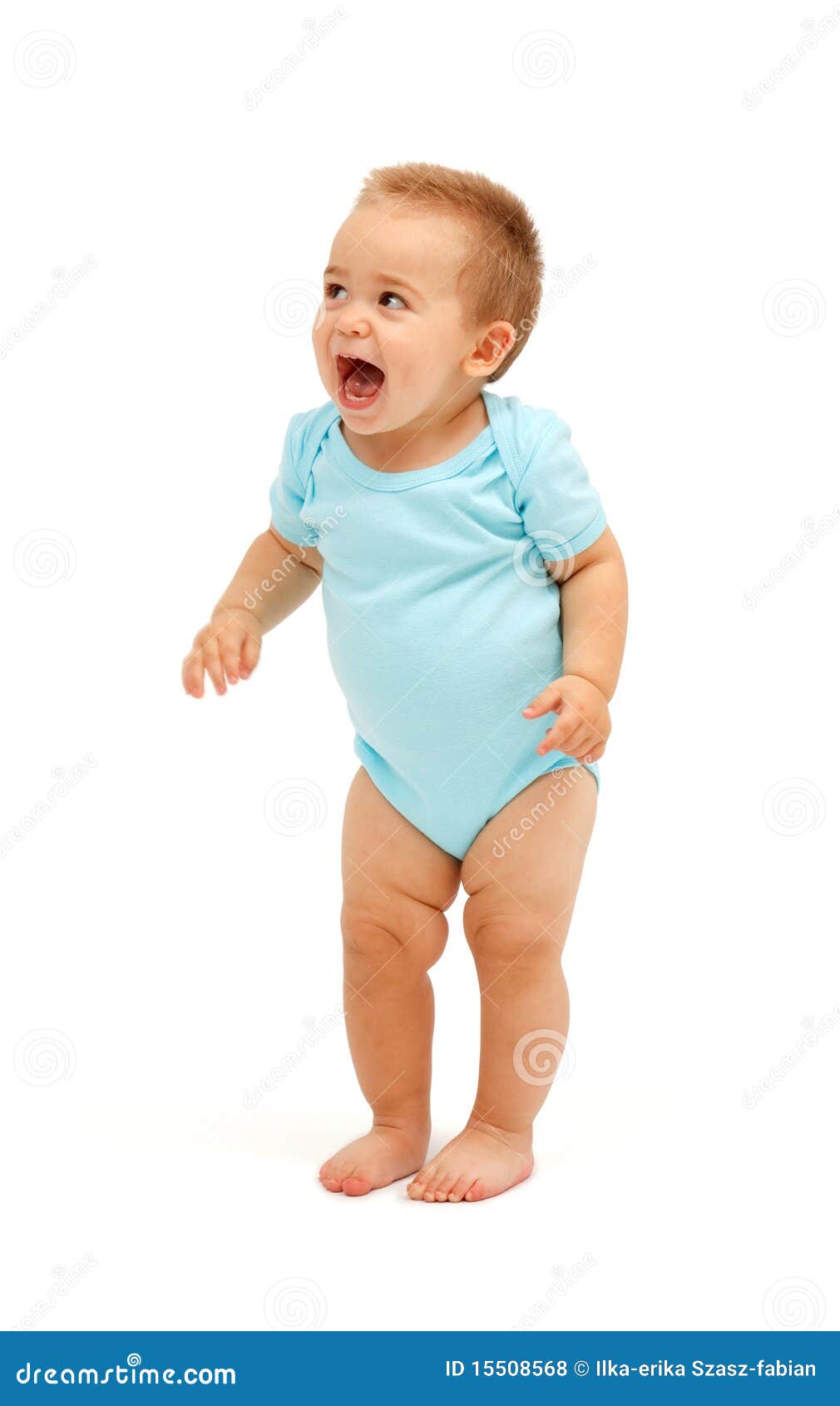 Joyful baby looking up stock photo. Image of isolated - 15508568