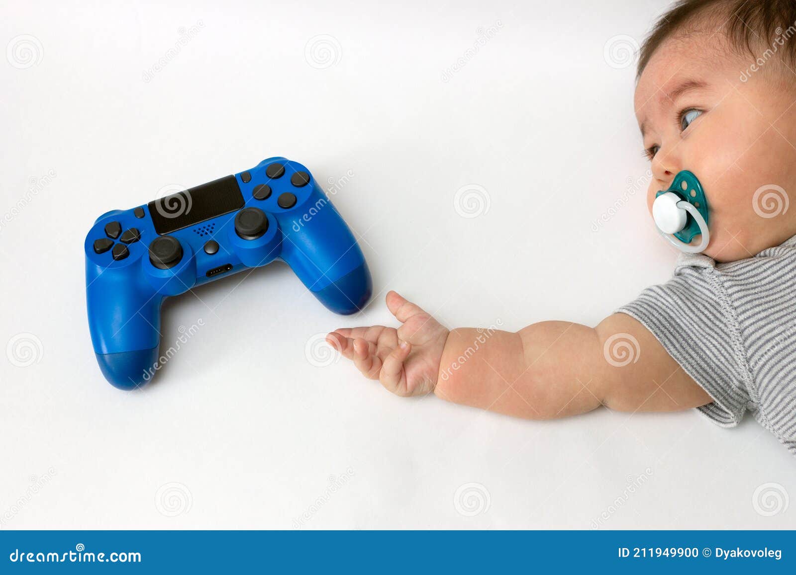 Baby Boy Using Video Game Controller. Isolated on White Background ...